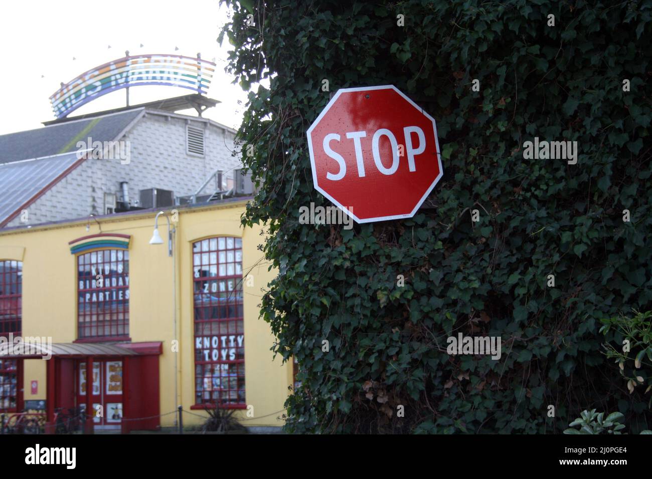 Red stop sign at the street in Vancouver Stock Photo - Alamy