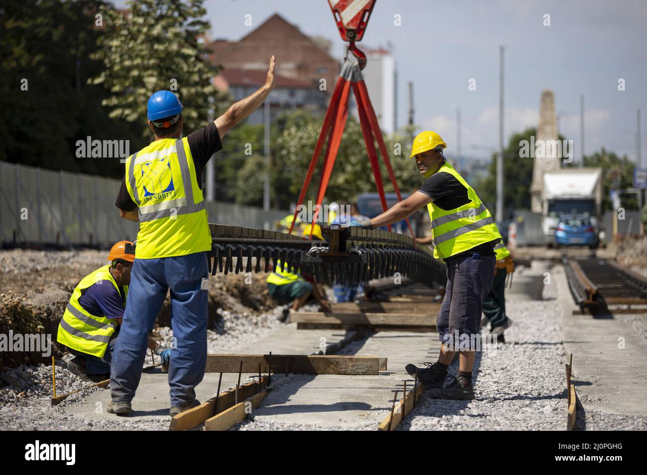 City workers install rails hi-res stock photography and images - Alamy