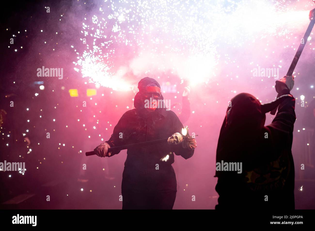March 19, 2022, Valencia, Spain: People hold fireworks during the ...