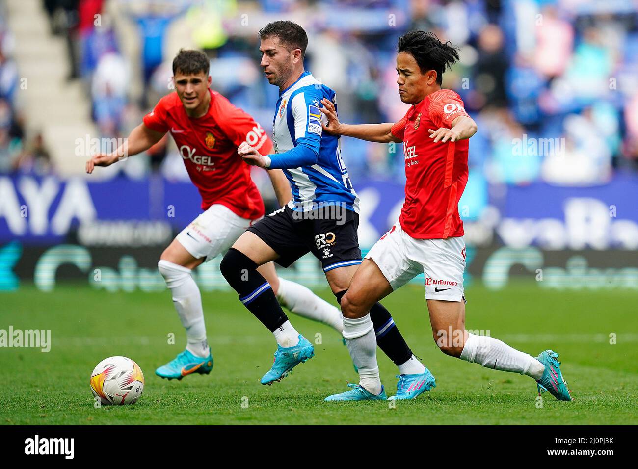 Takefusha Kubo of RCD Mallorca and Adrian Embarba of RCD Espanyol ...