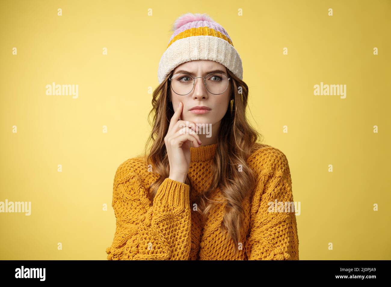 Serious-looking complicated attractive smart girl solving issue mind ...