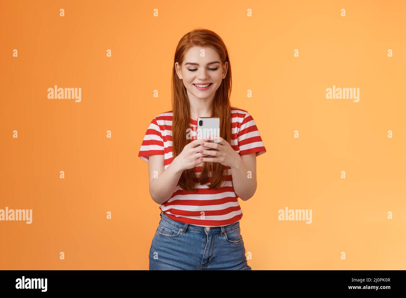Friendly outgoing modern ginger girl communicating friends, chatting ...