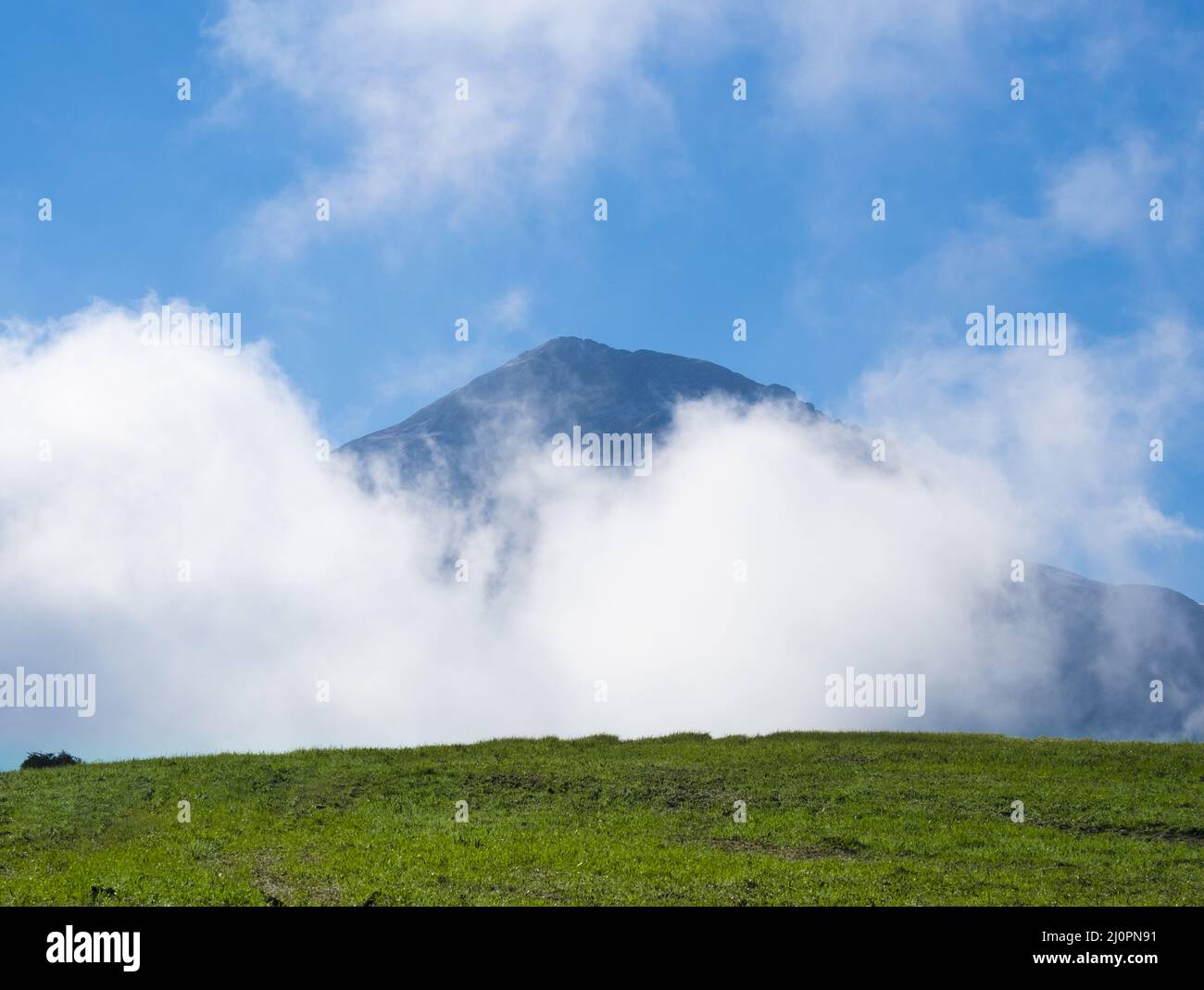 Mount Txindoki among the clouds in the Natural Park of the Aralar ...