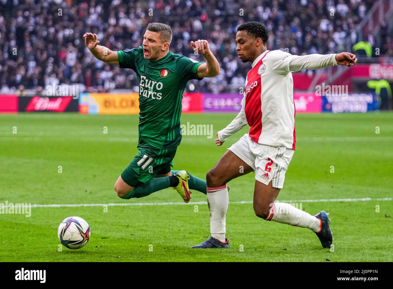 Amsterdam - Bryan Linssen of Feyenoord, Jurrien Timber of Ajax during ...