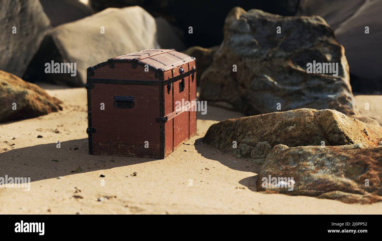 Treasure chest in sand dunes on a beach Stock Photo - Alamy
