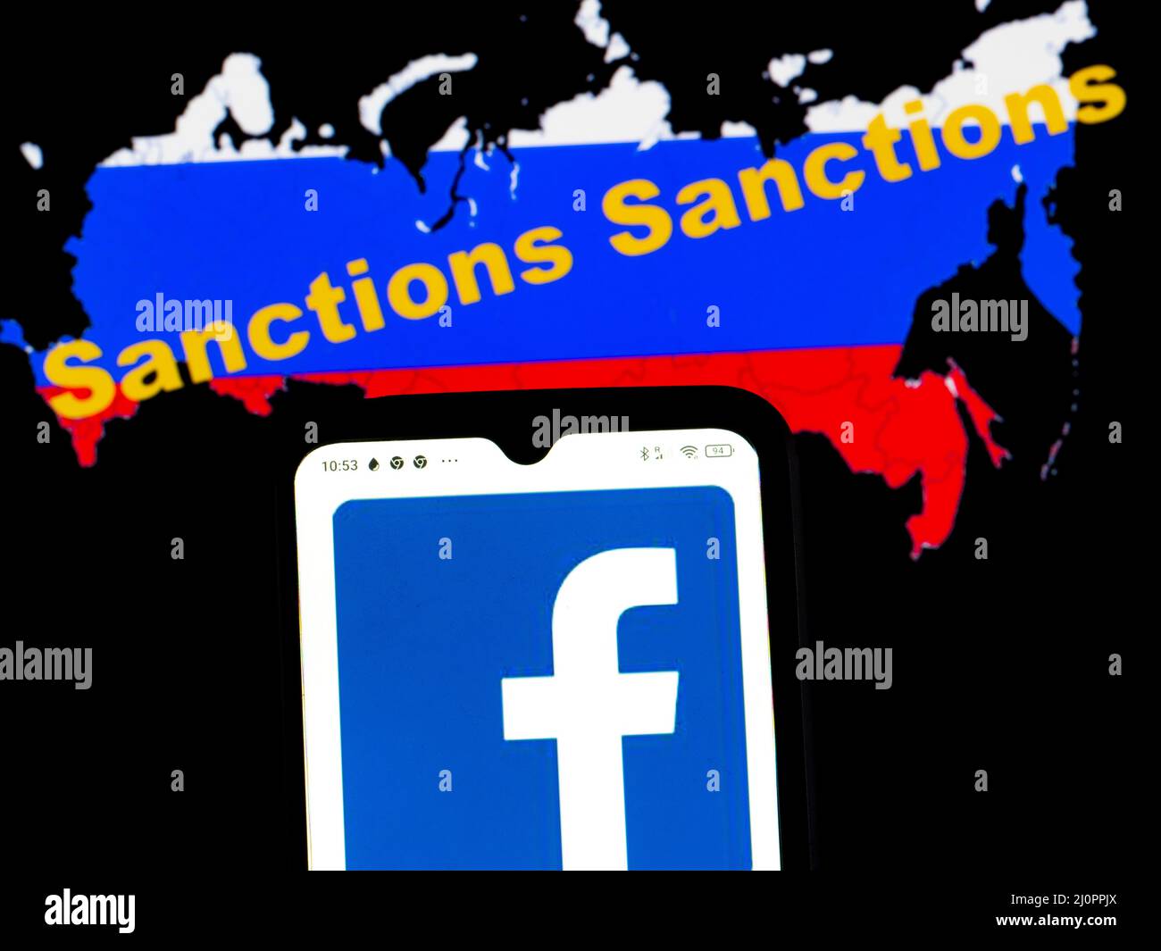 In this photo illustration, the Facebook logo is displayed on a ...