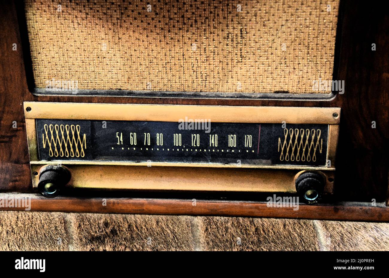 Tuner on this antique radio is turned to a channel over 170. Artistic ...