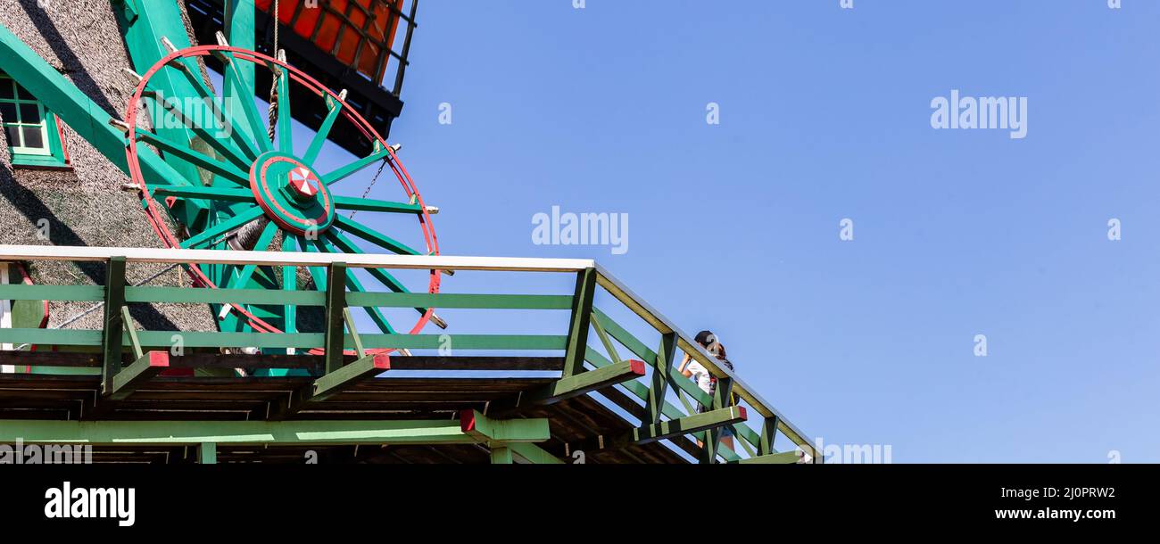 Colorful turning wheel of colorful old windmill in The Neteherlands ...