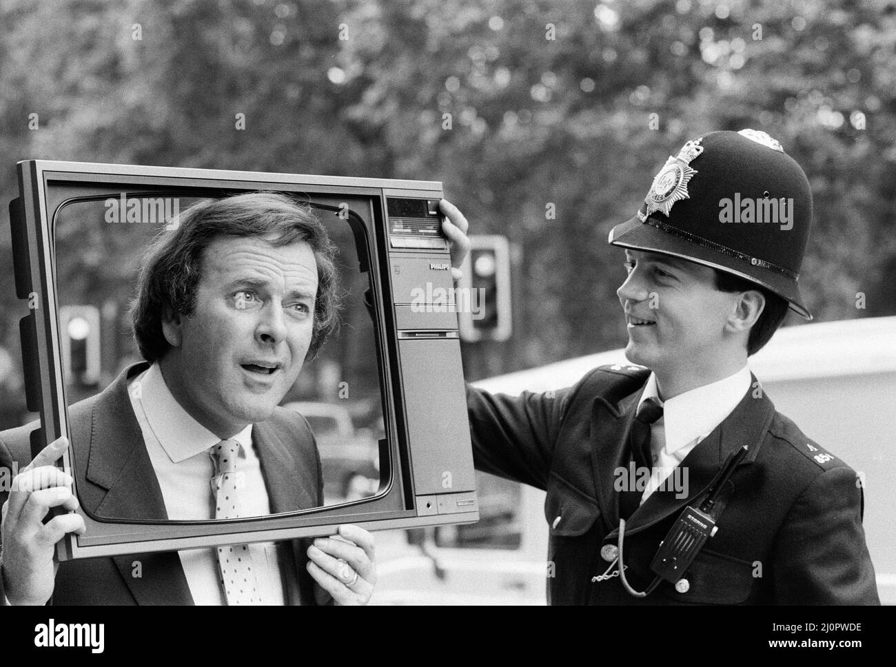 Terry Wogan was given 100 new TV sets today. They are being presented ...