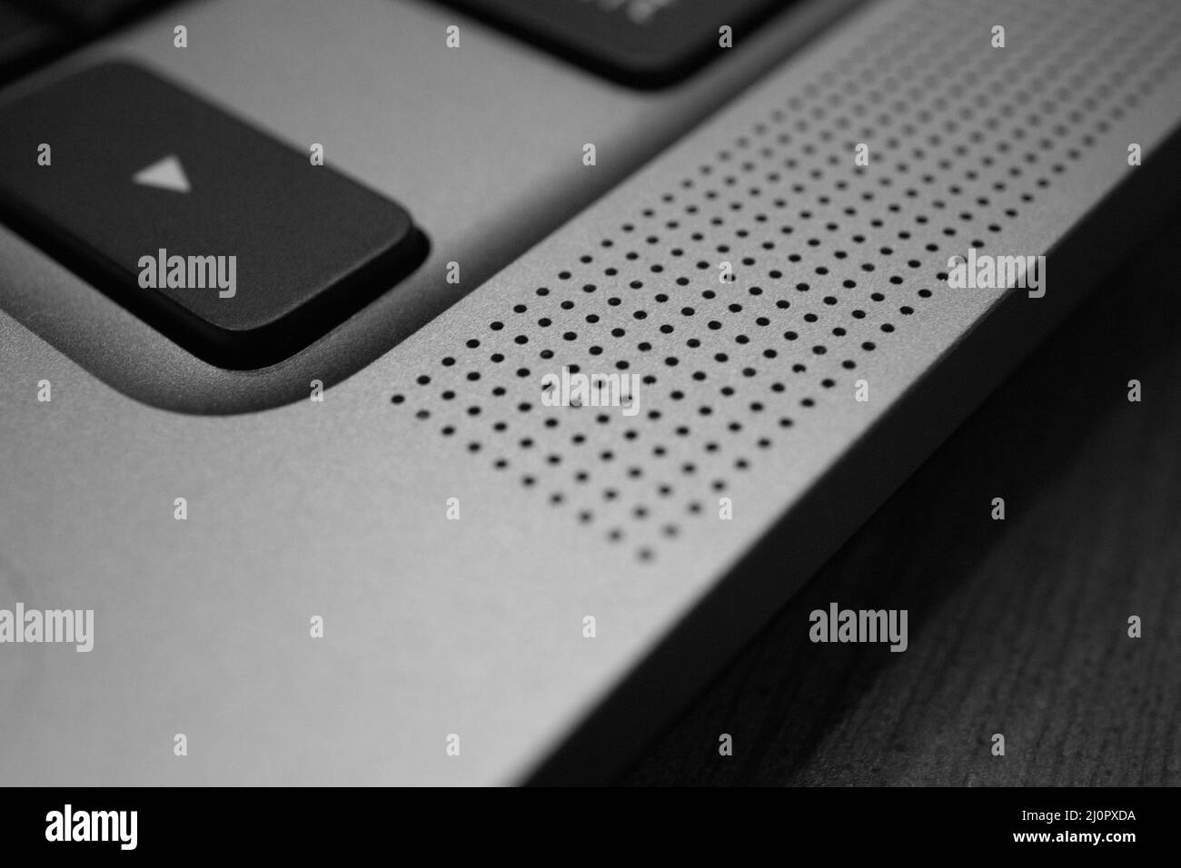 Closeup of laptop speaker near the keyboard Stock Photo - Alamy