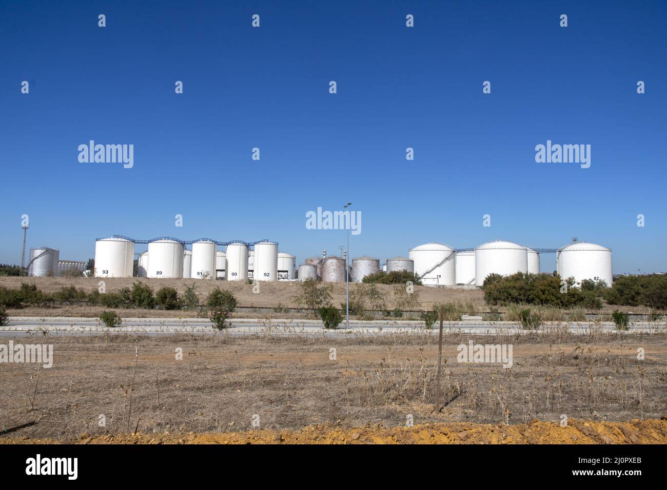 Photo of industrial fuel storage tanks at oil terminal Stock Photo - Alamy