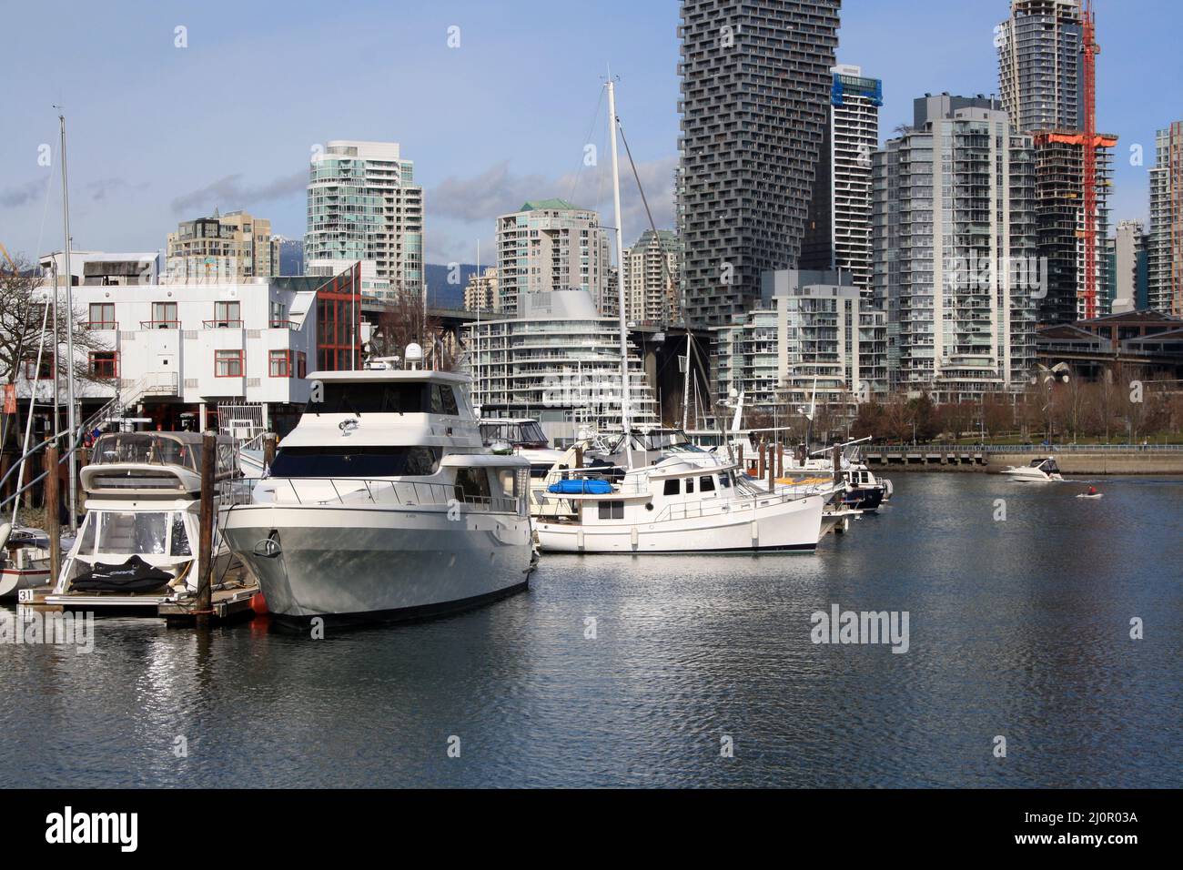 Several boats and yachts at a seaport in Vancouver Stock Photo - Alamy
