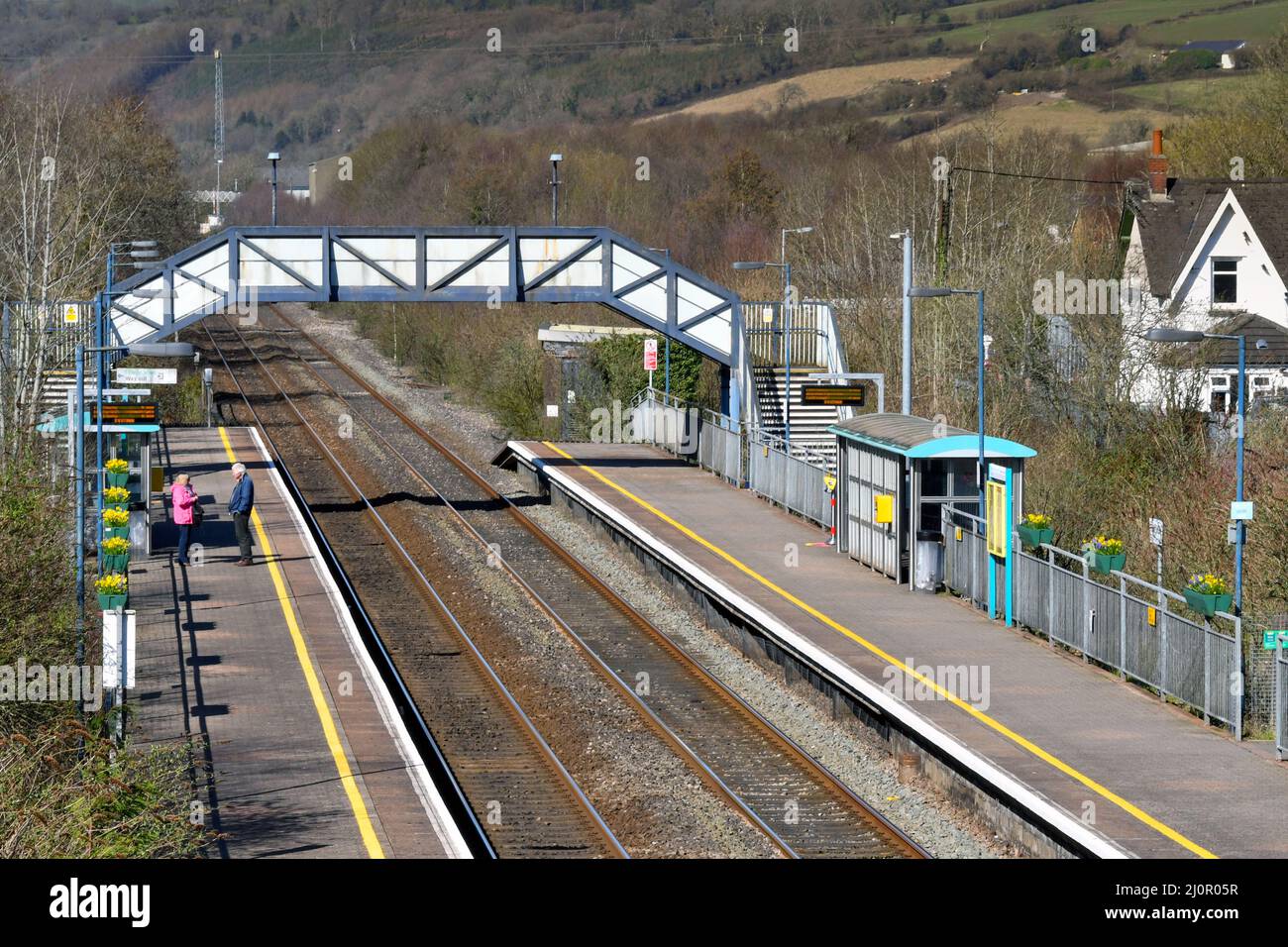 Pontyclun, Wales - March 2022: Aerial view of people waiting for a ...