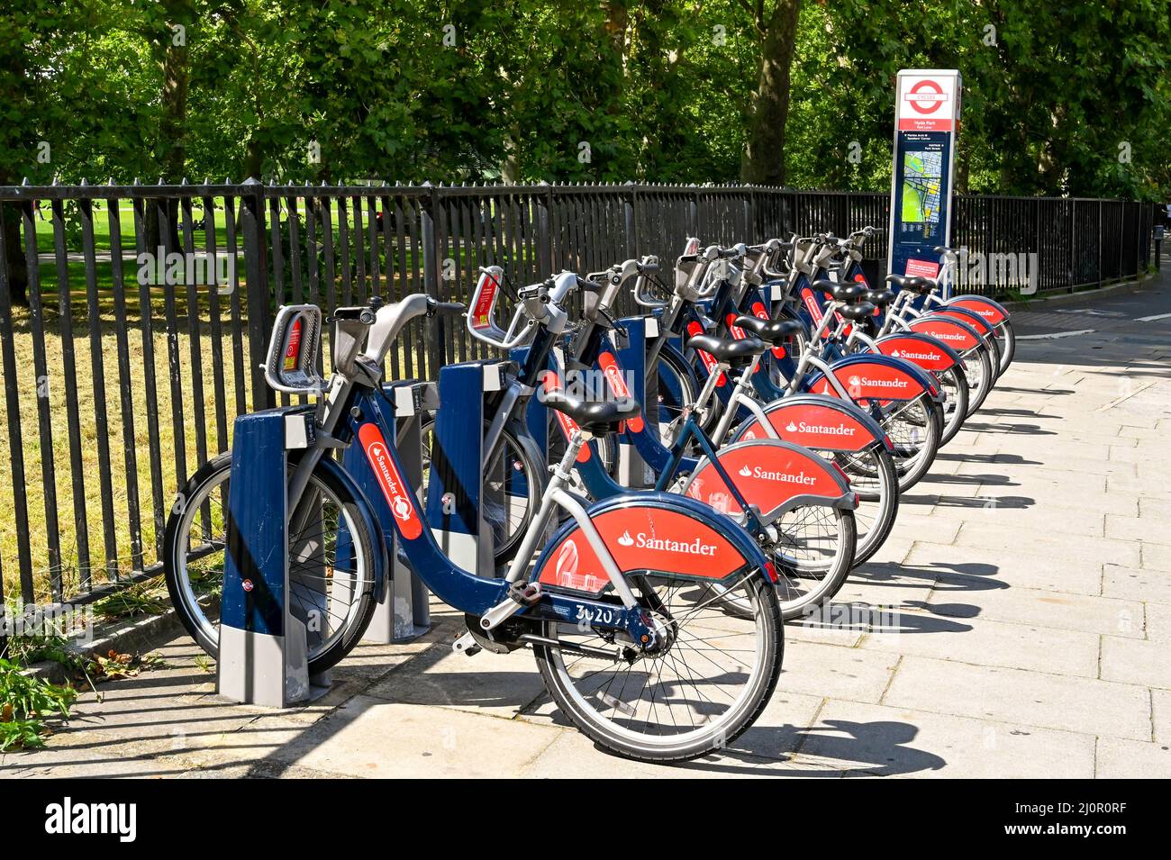 London, England - August 2021: Row of bicycles in a parking station as ...