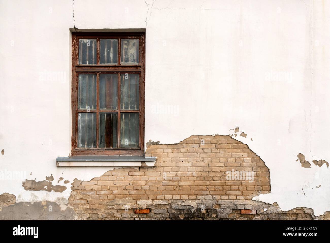Window in damaged wall Stock Photo - Alamy