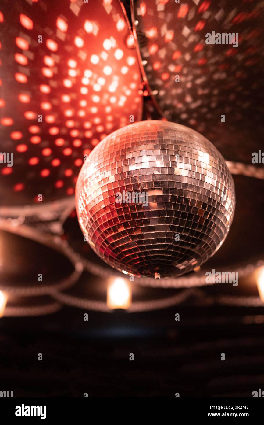 Spinning red disco ball hi-res stock photography and images - Alamy