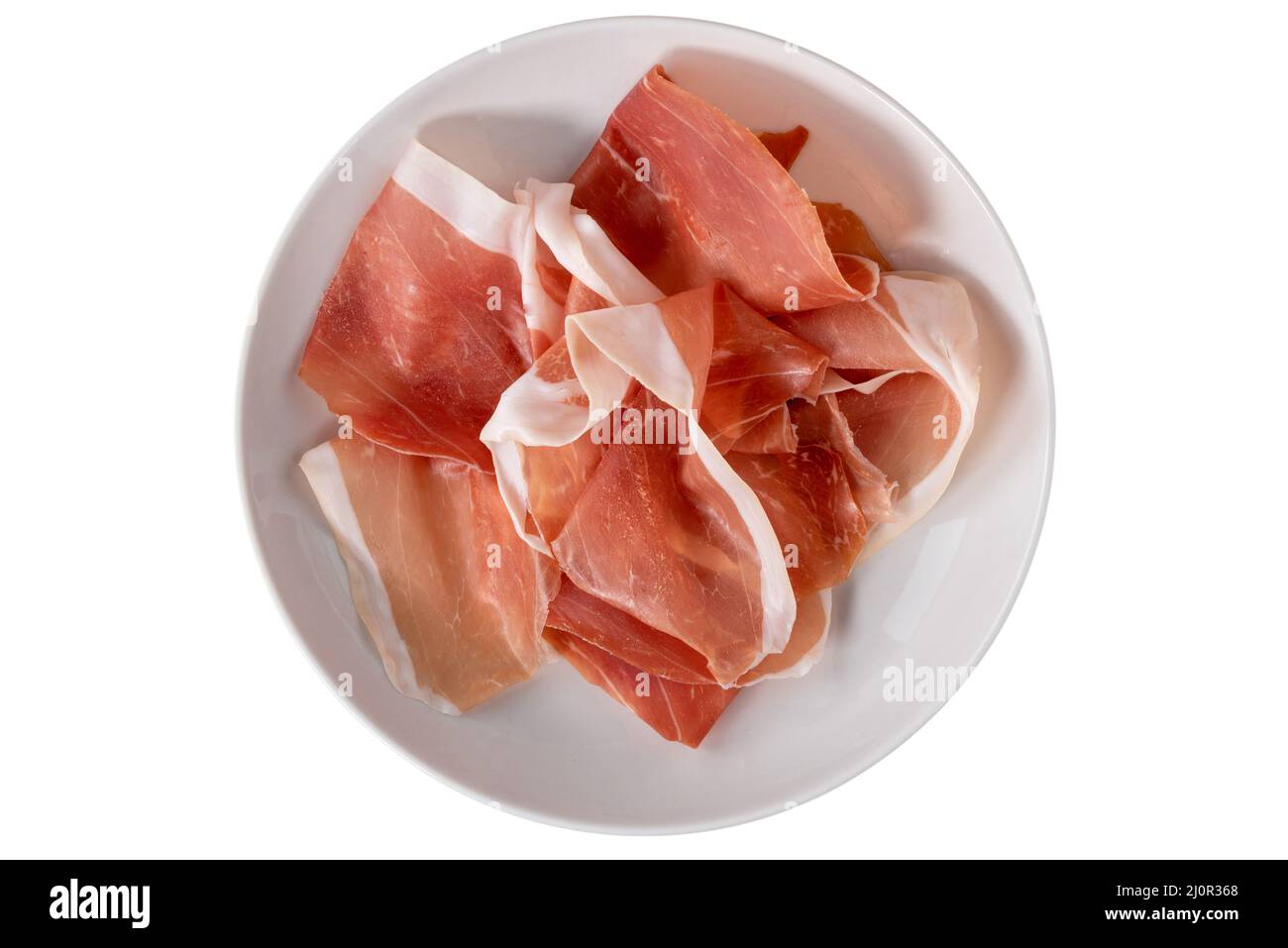 Sliced Parma ham in white dish isolated on white, clipping path, top ...