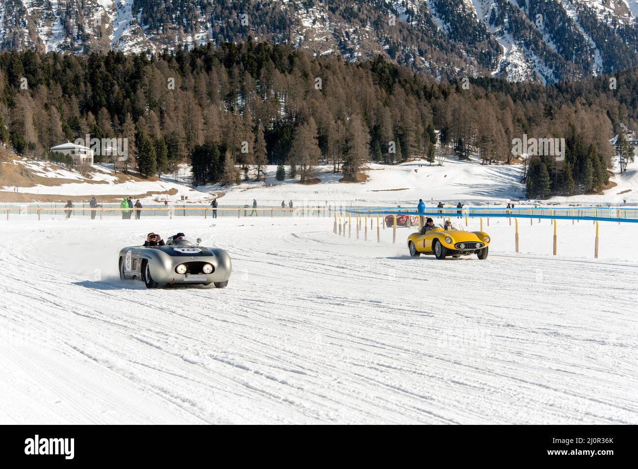 Classic vintage antique sports cars racing on the frozen lake of St ...