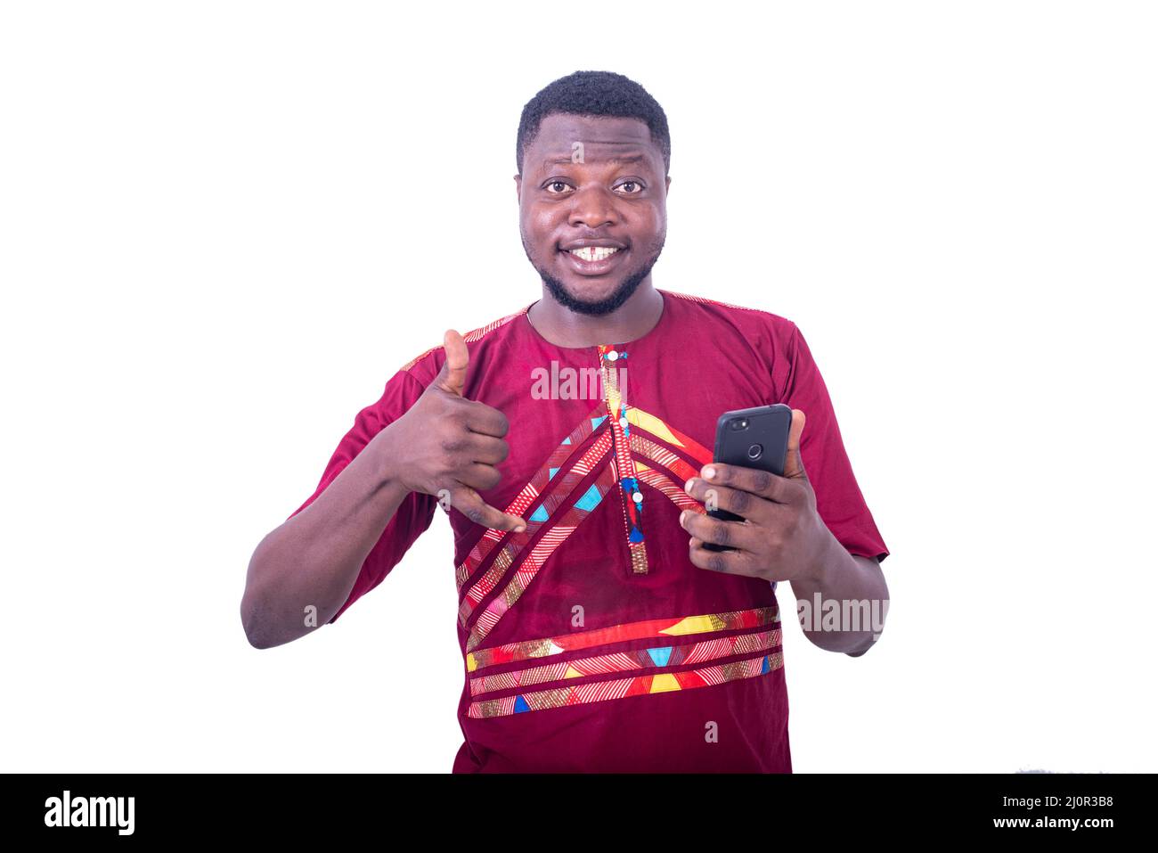 Adult Man Holding Mobile Phone And Making Mobile Phone Gesture Finger