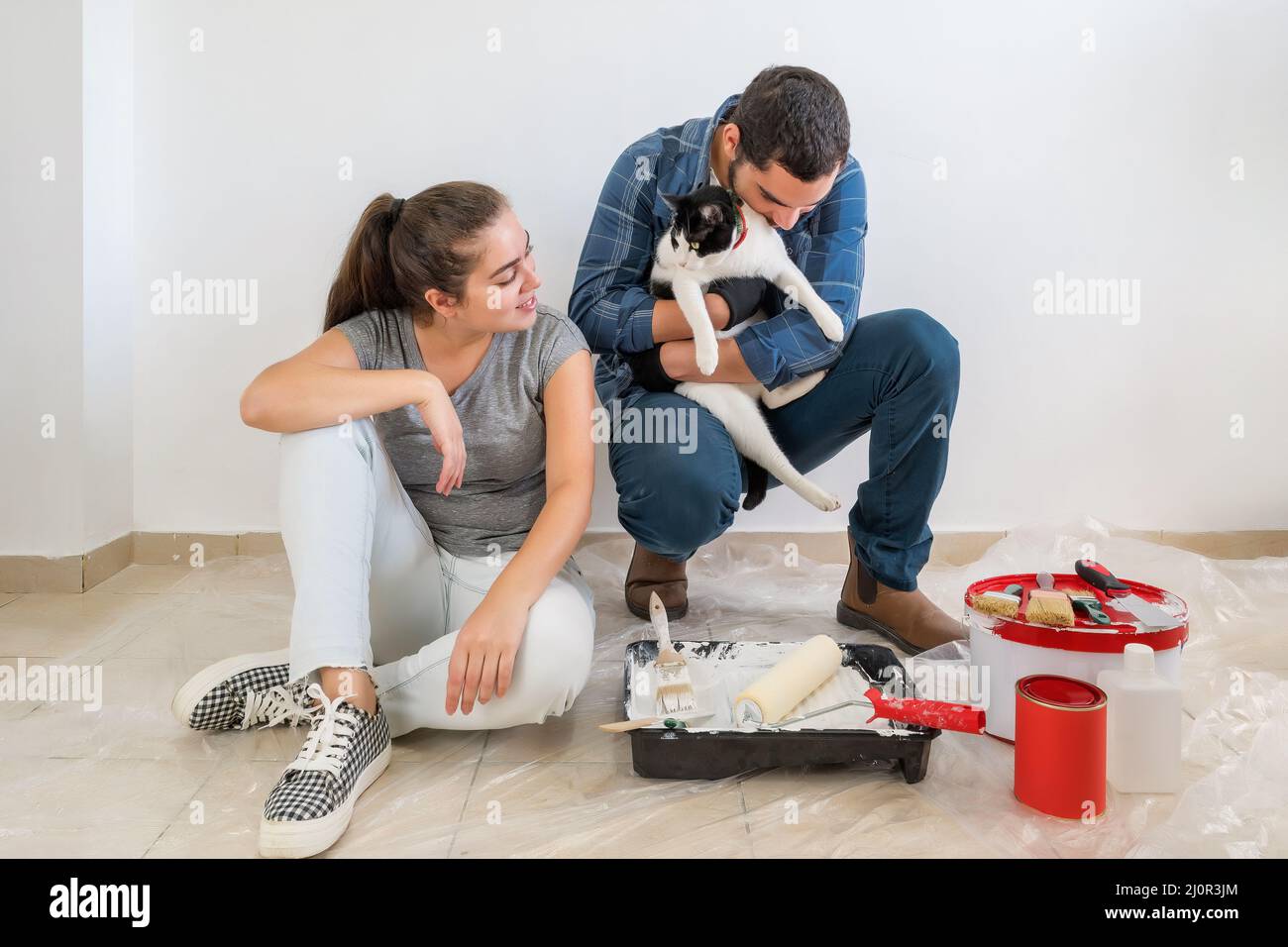 Happy family doing repair home hi-res stock photography and images - Alamy
