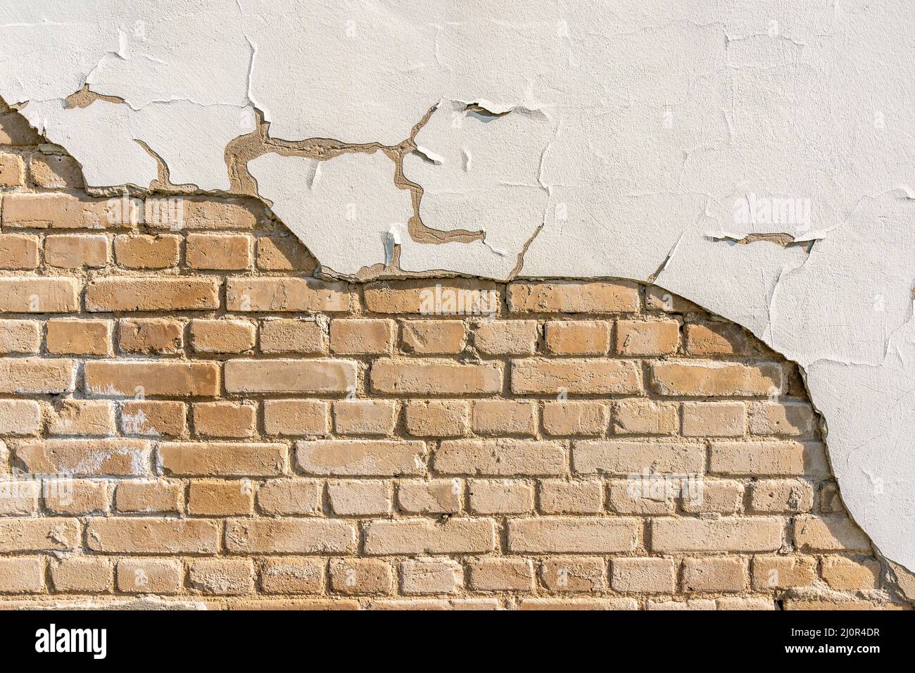 White Brick Wall With Damage Surface Stock Photo - Alamy