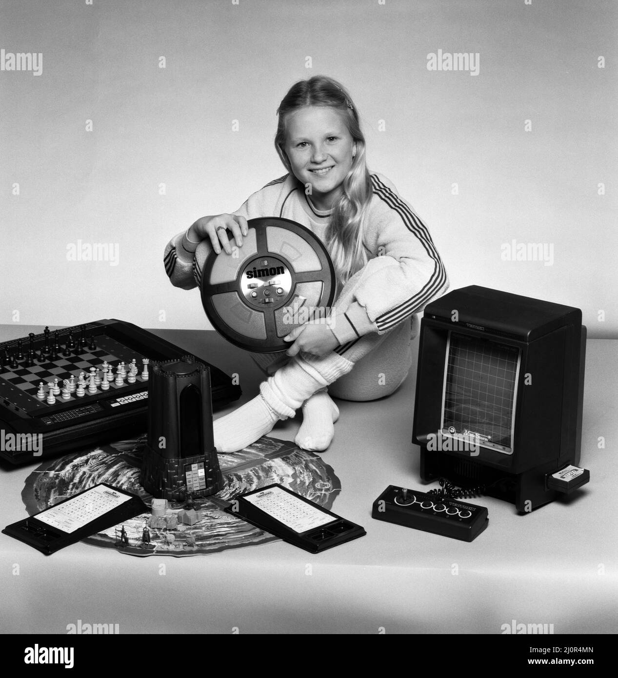 A young girl with a selection of children's toys. 11th November 1983 ...
