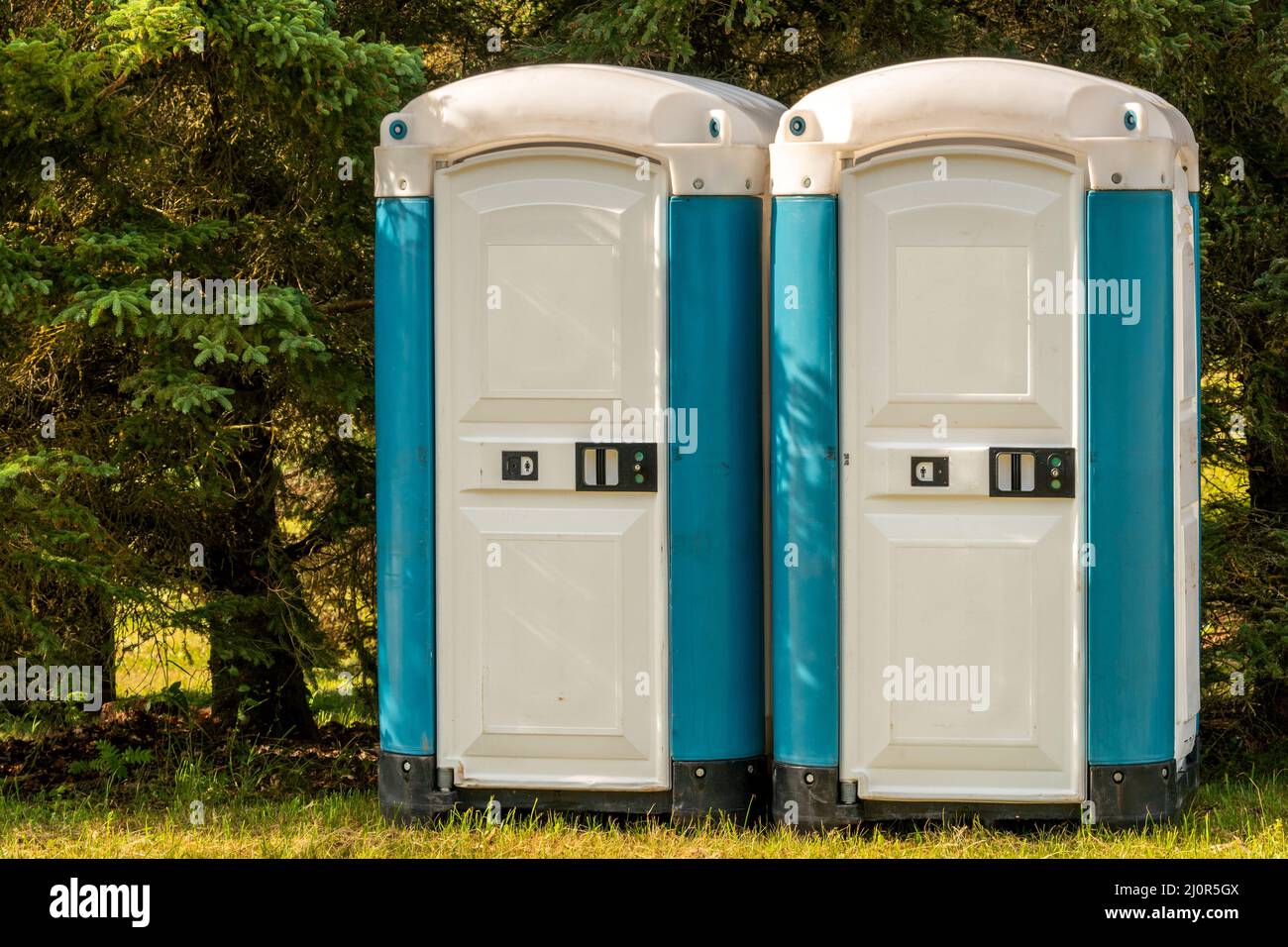 Portable toilets at an outdoor event Stock Photo - Alamy