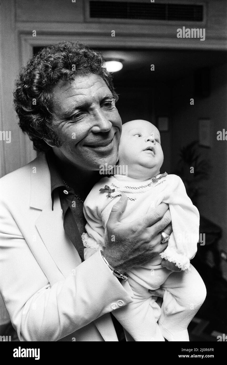 Tom Jones with his grandson Alexander, aged eleven months, in their ...