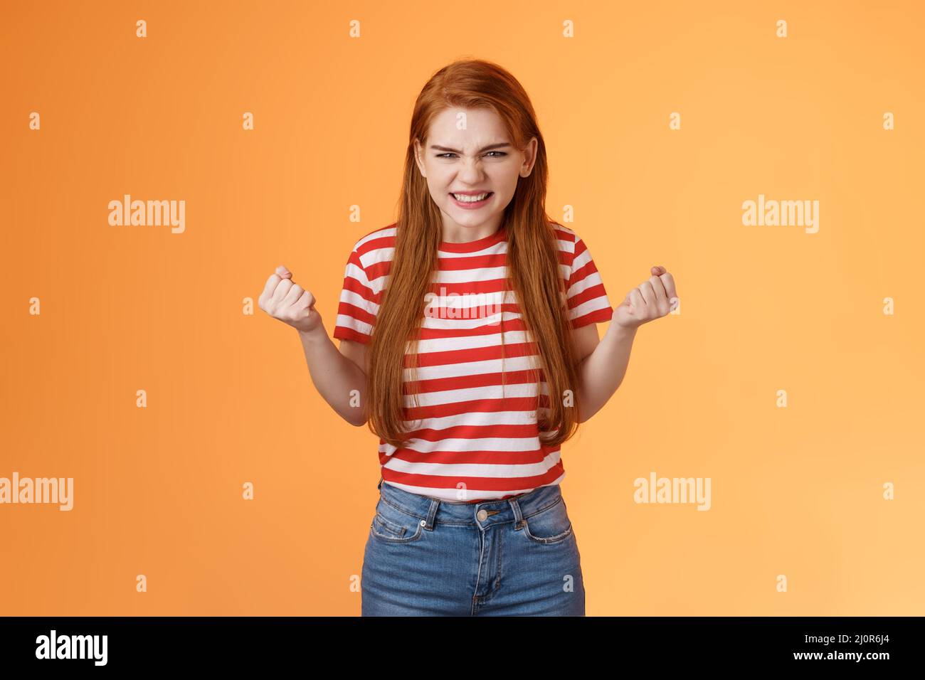 Annoyed pissed redhead female lose competition, clench fists angry ...