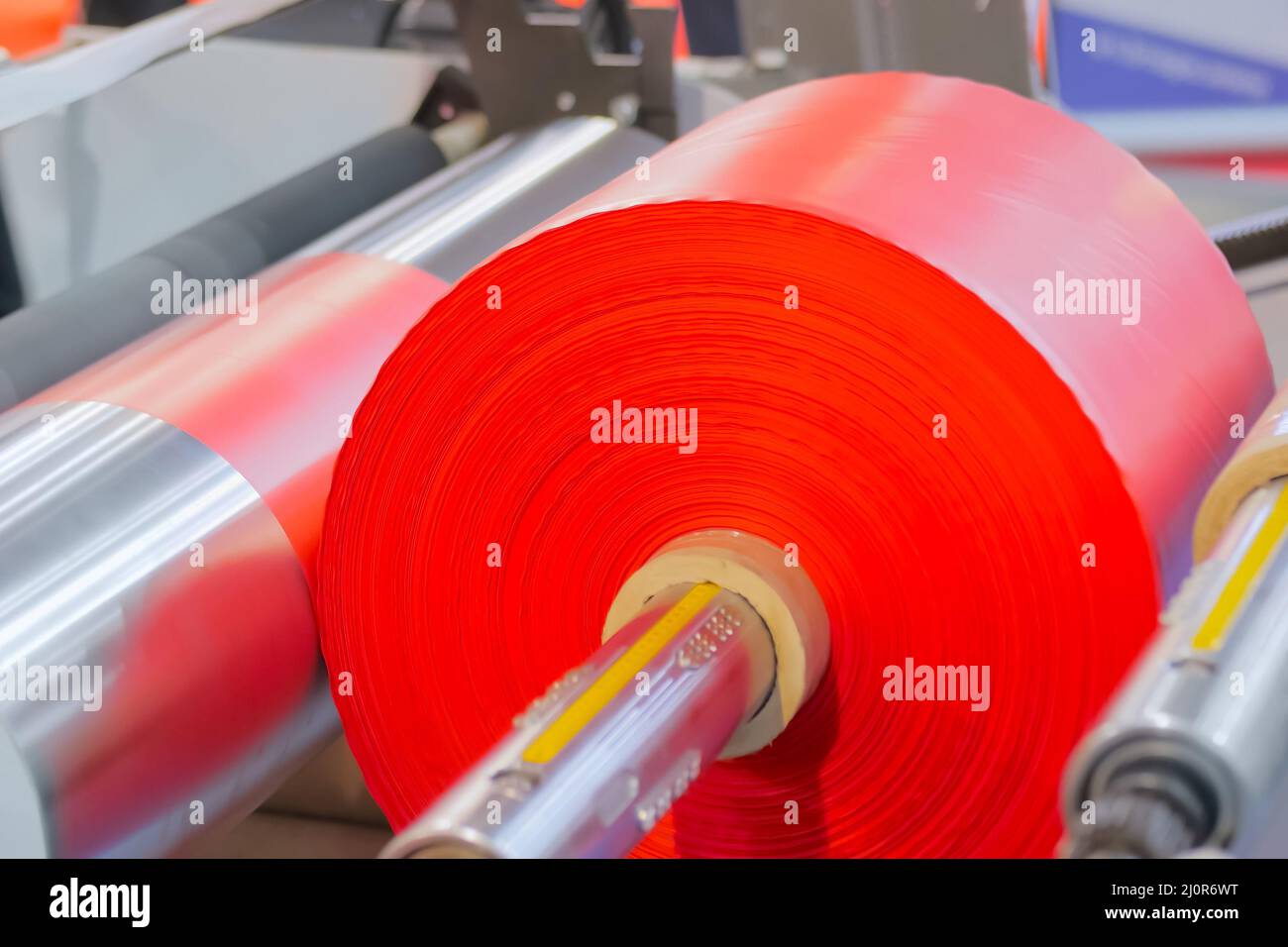 Automatic plastic bag making machine - moving roller: close up Stock ...