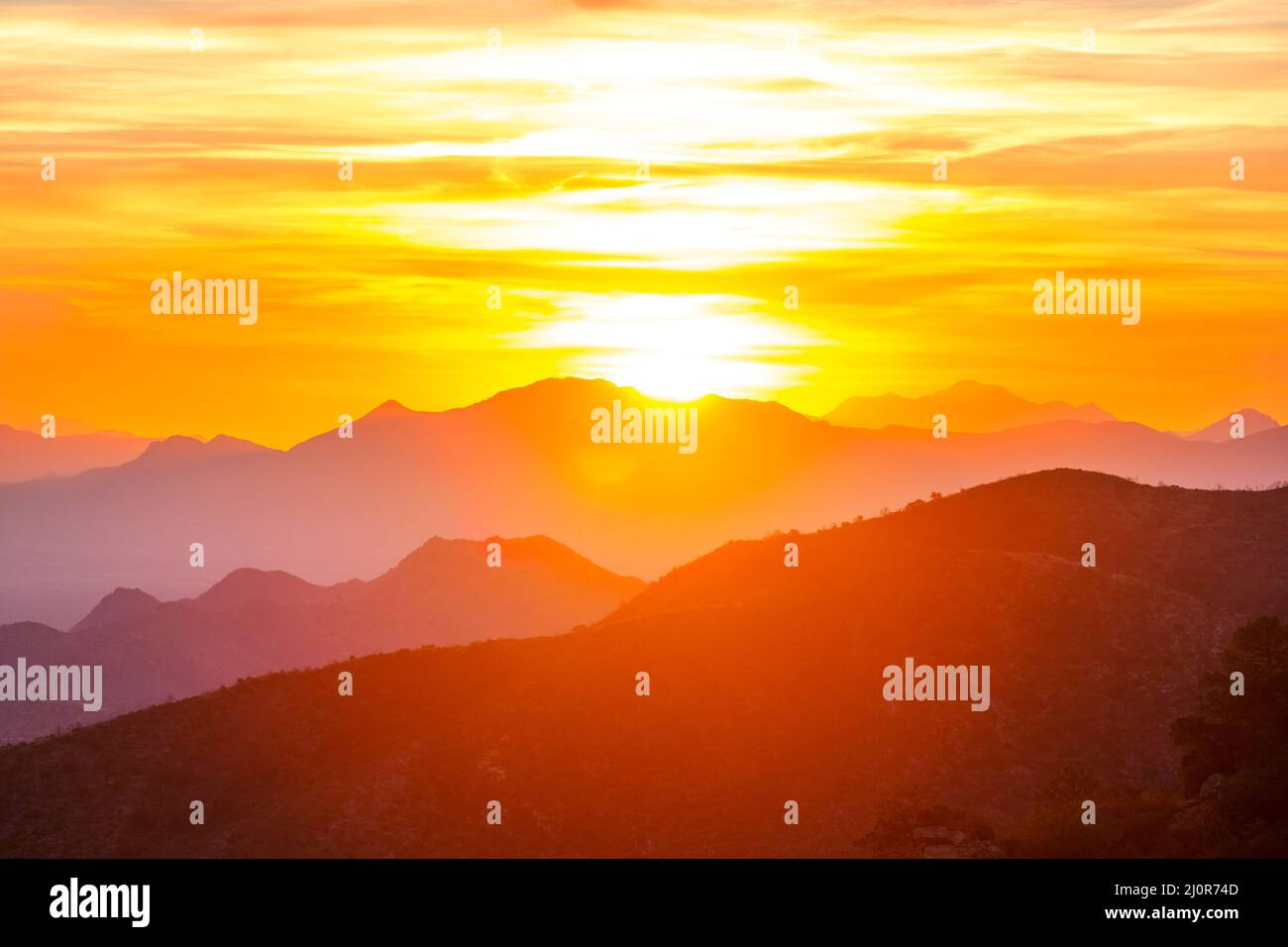 Mountains on sunset Stock Photo - Alamy