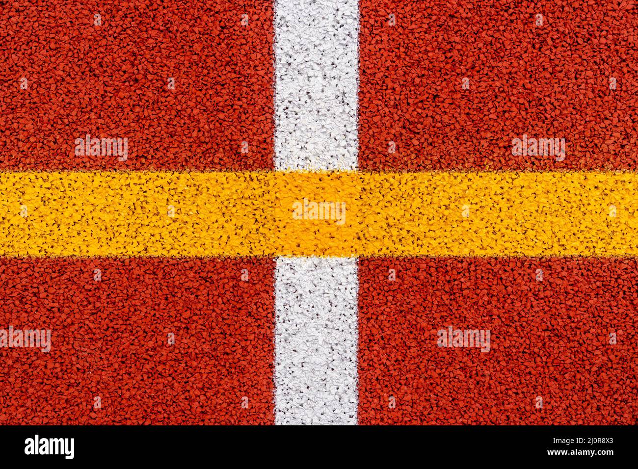 White and yellow crossed lines on the running track Stock Photo - Alamy