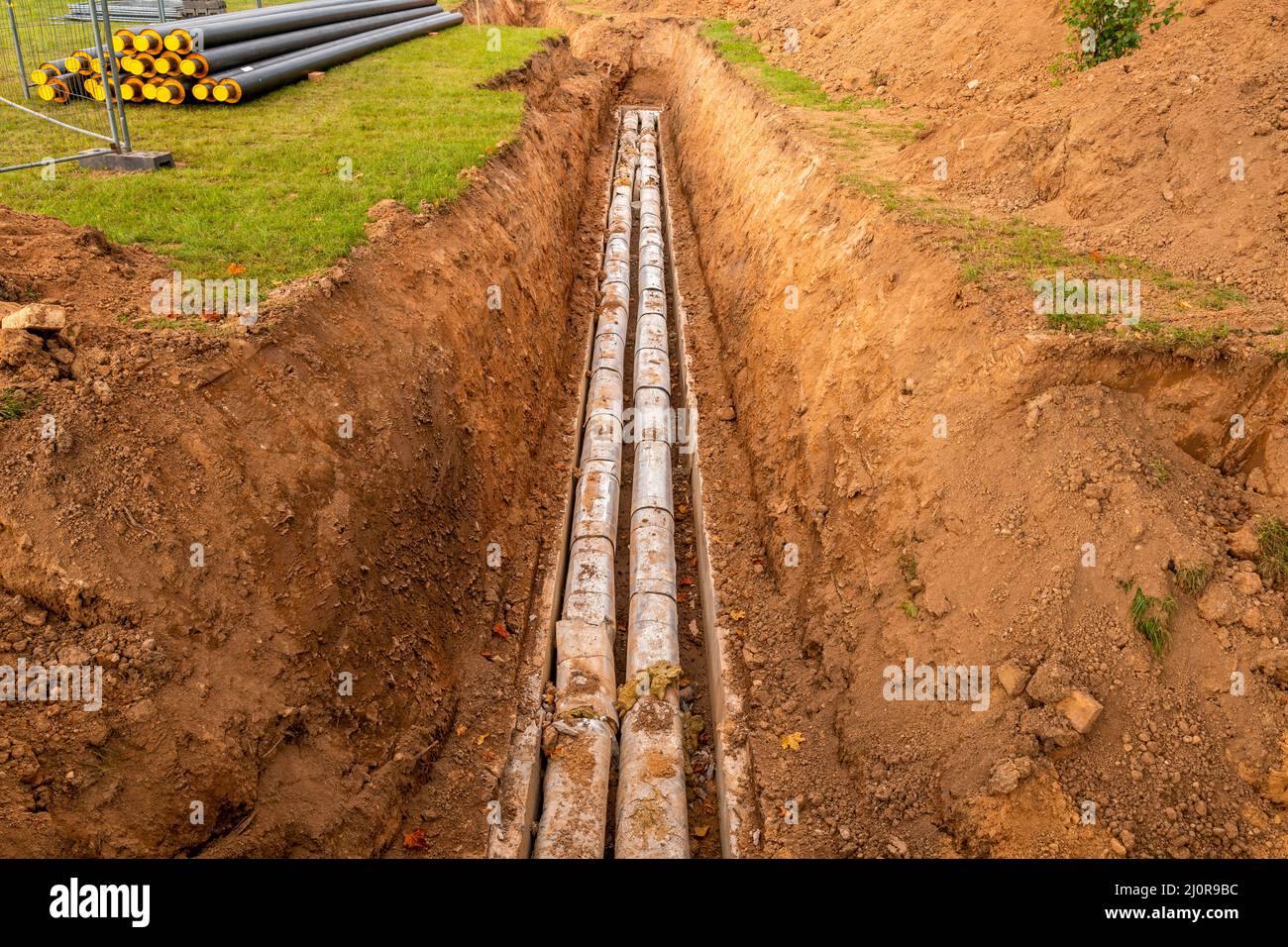 Maintenance and repair of underground pipe system Stock Photo - Alamy