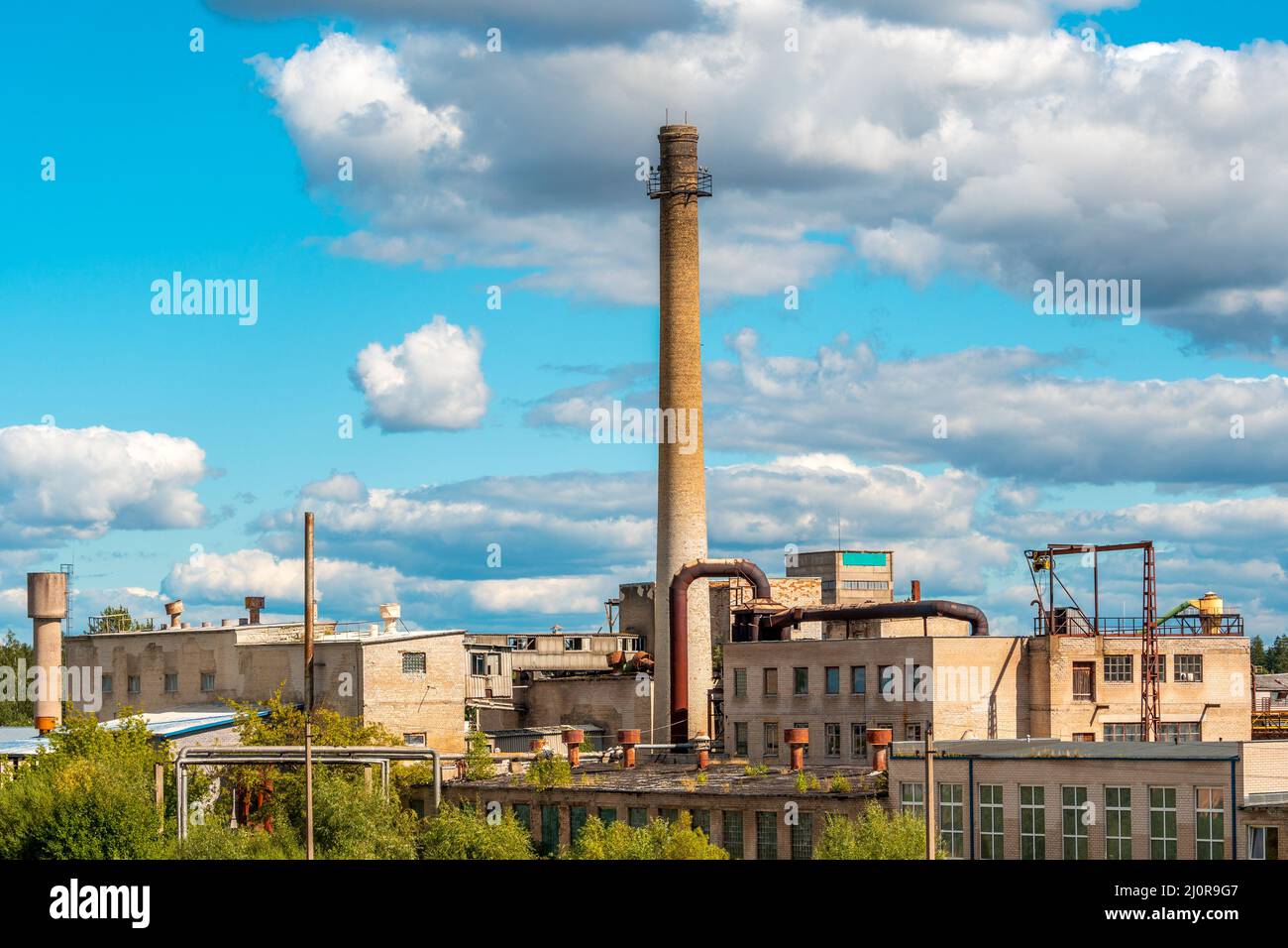 Huge pipe of an old factory Stock Photo - Alamy