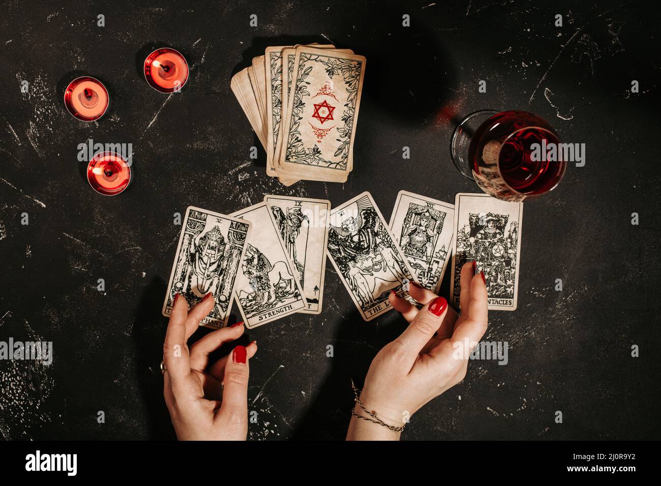 Tarot card reading table hi-res stock photography and images - Alamy