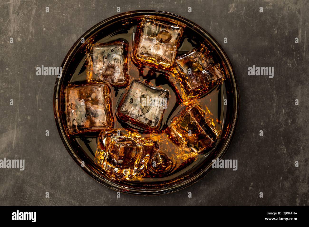 Glass of cola with ice Stock Photo - Alamy