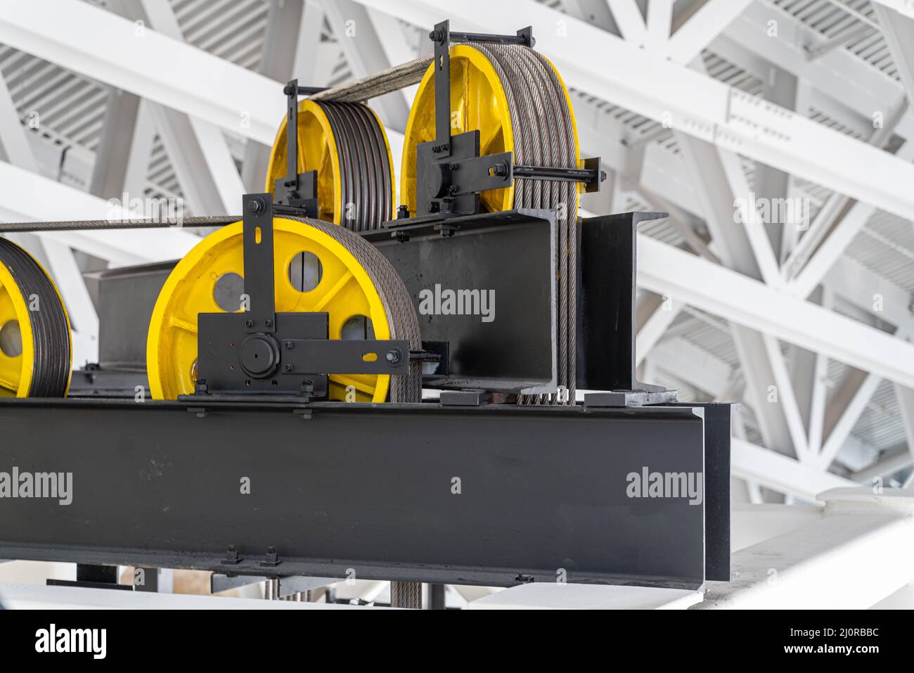 elevator motor at the top of a lift shaft Stock Photo - Alamy