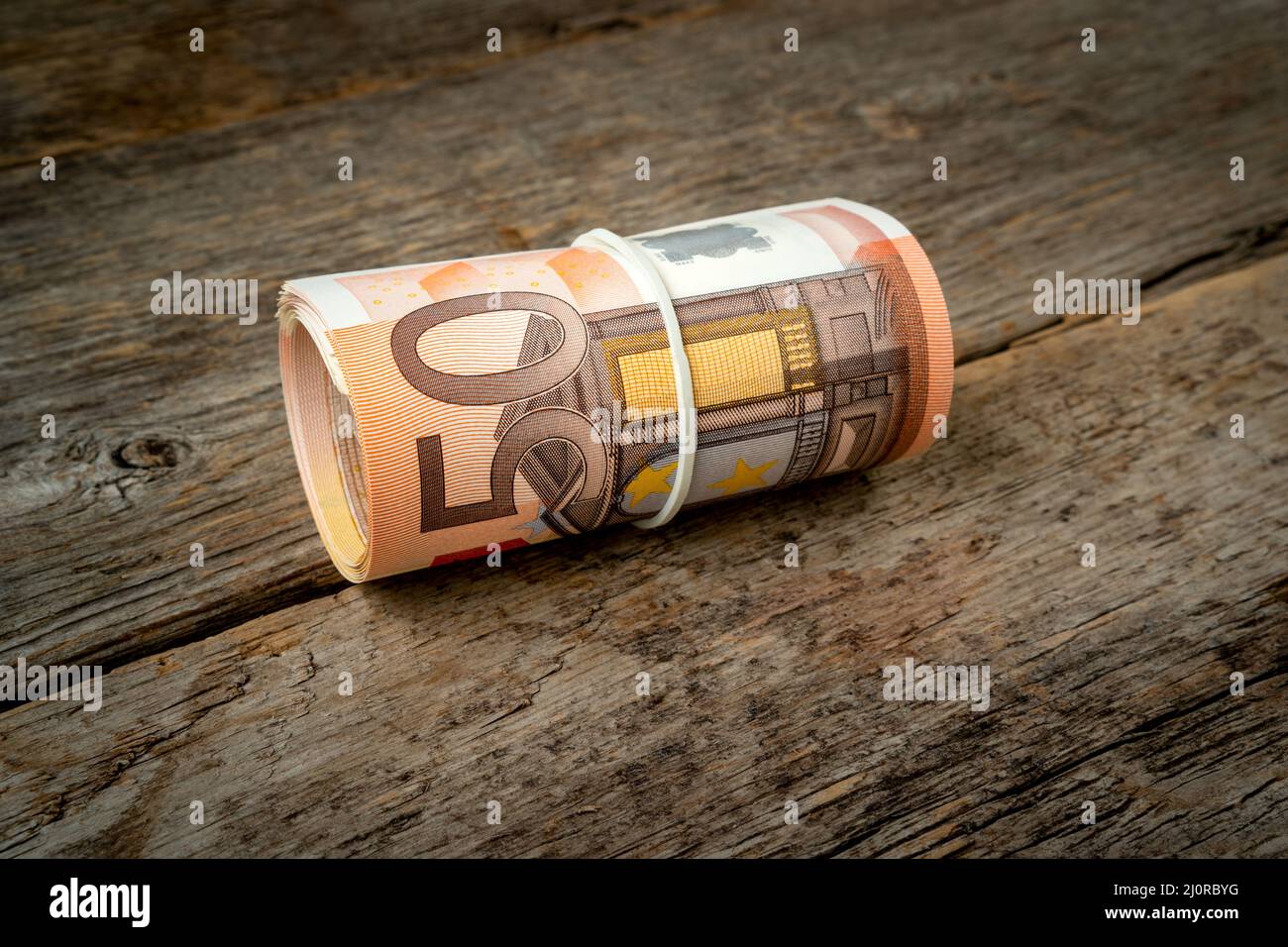 Roll of banknotes hi-res stock photography and images - Alamy