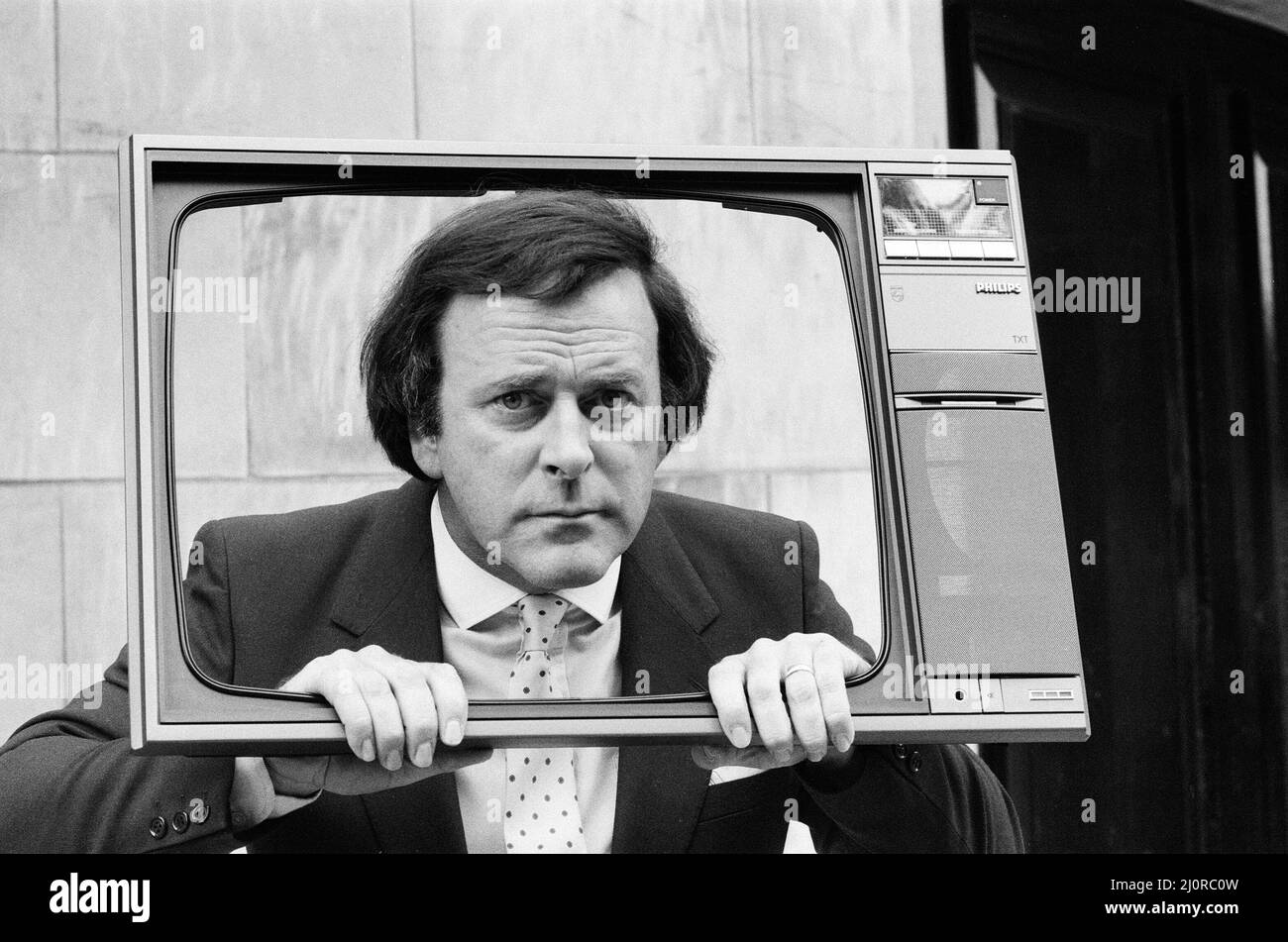 Terry Wogan was given 100 new TV sets today. They are being presented ...