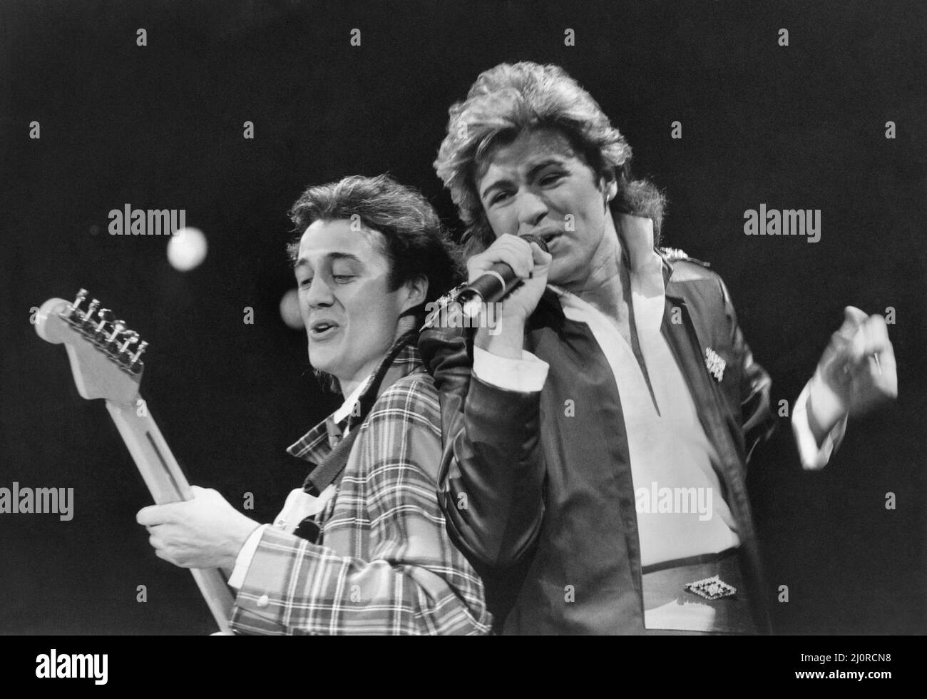 George Michael and Andrew Ridgley (left) of pop duo Wham! performing on ...