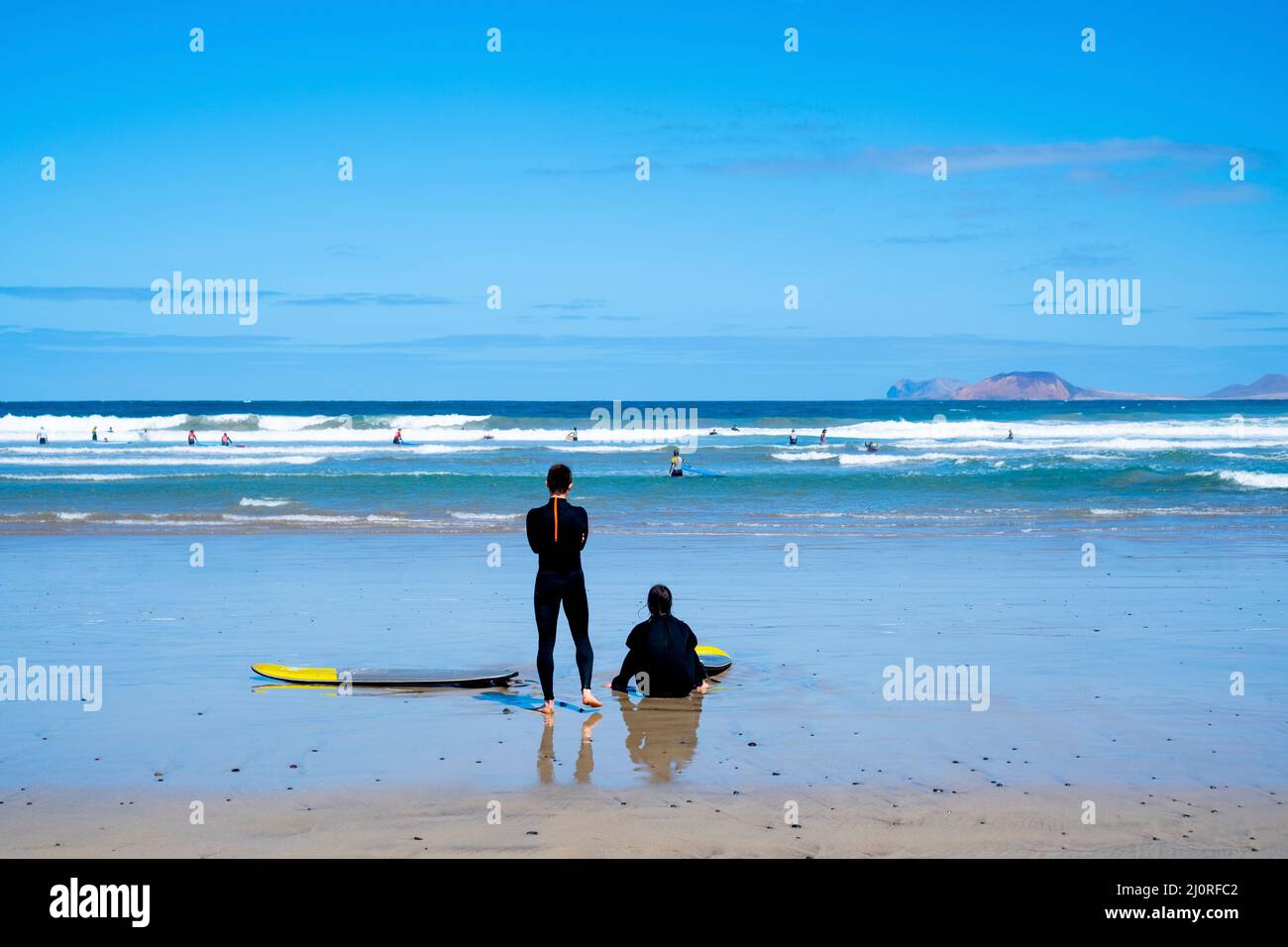 Two surfers enjoy board hi-res stock photography and images - Alamy