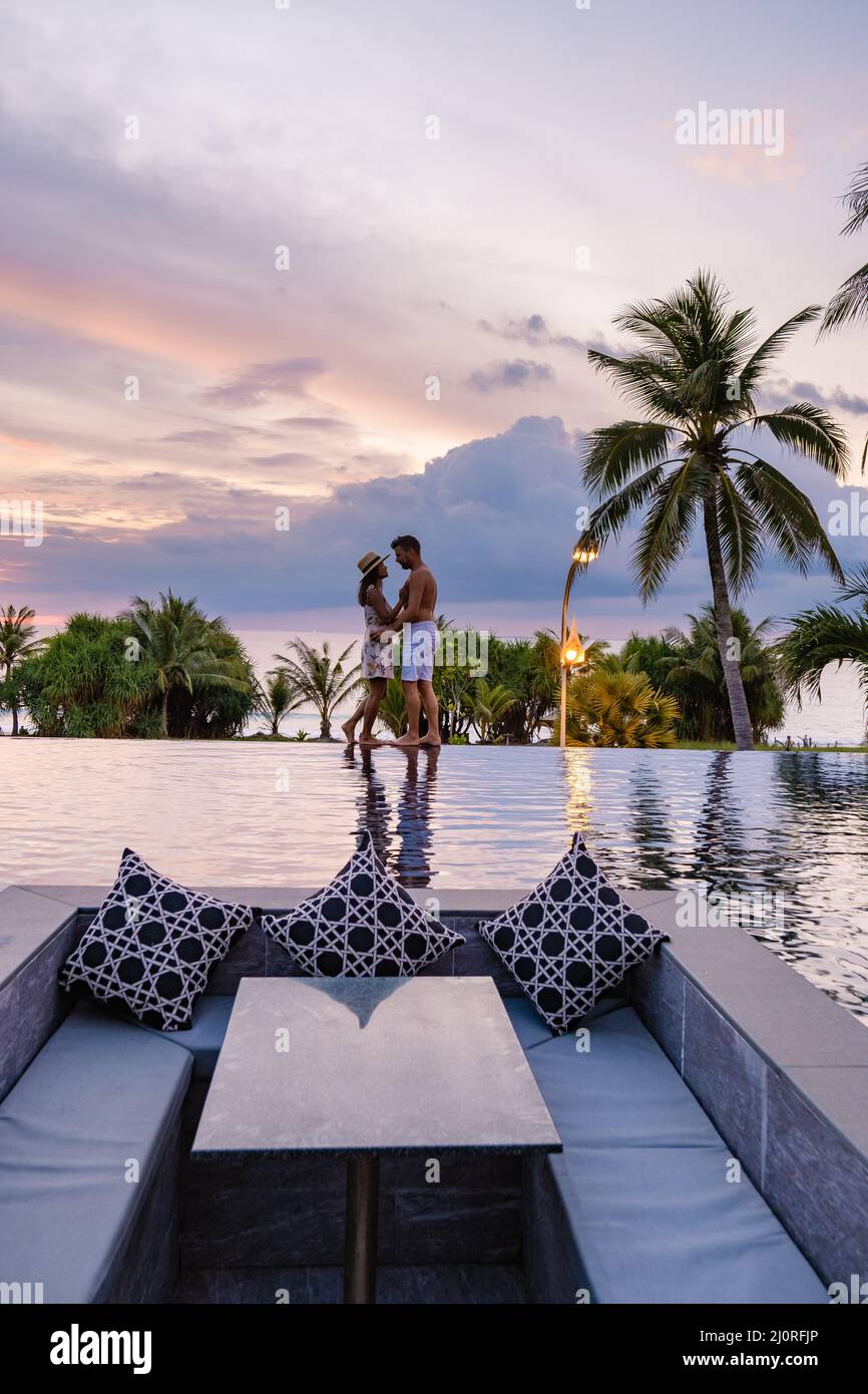 Watching sunset from infinity pool hi-res stock photography and images ...