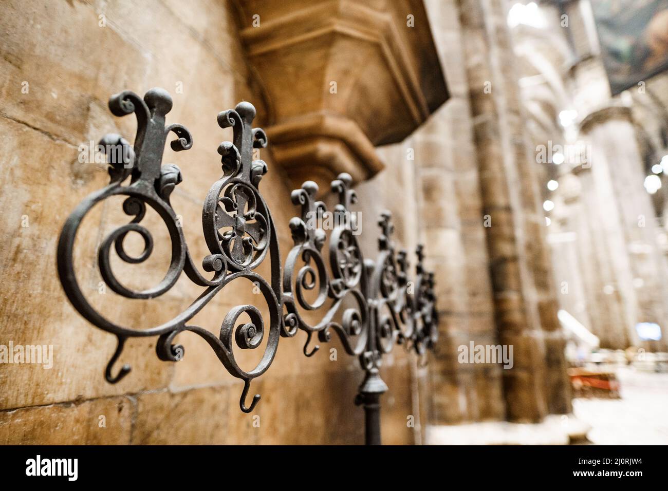 Forged metal stands in the Duomo Cathedral. Milan, Italy Stock Photo ...