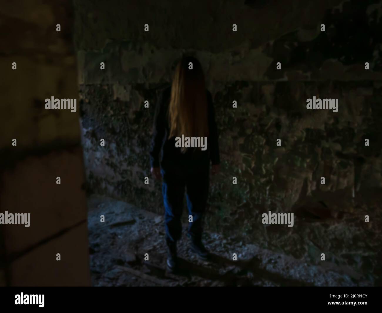 Woman inside dark room hi-res stock photography and images - Alamy