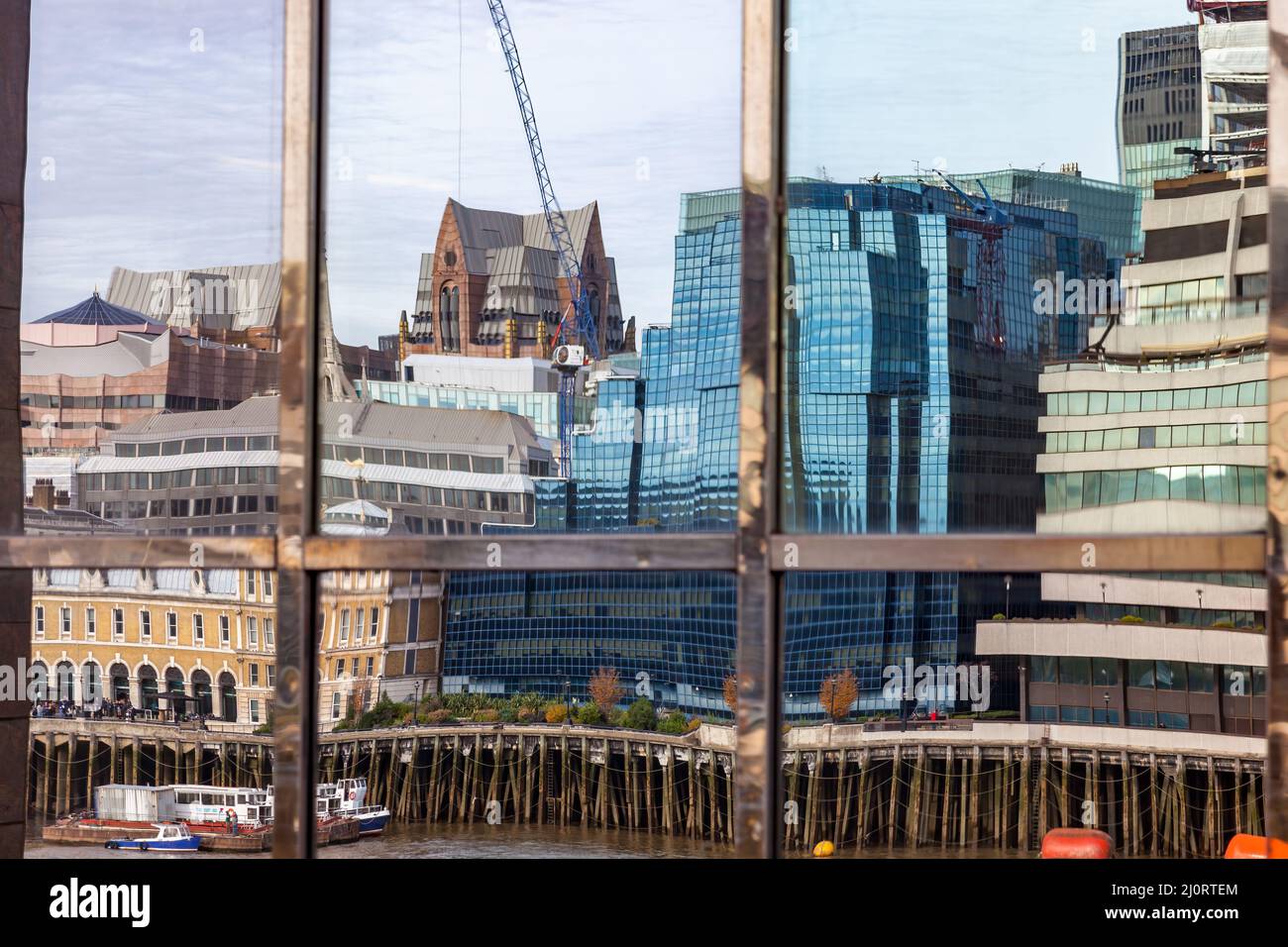 LONDON, UK - NOVEMBER 6 : London skyline reflected in a window in ...
