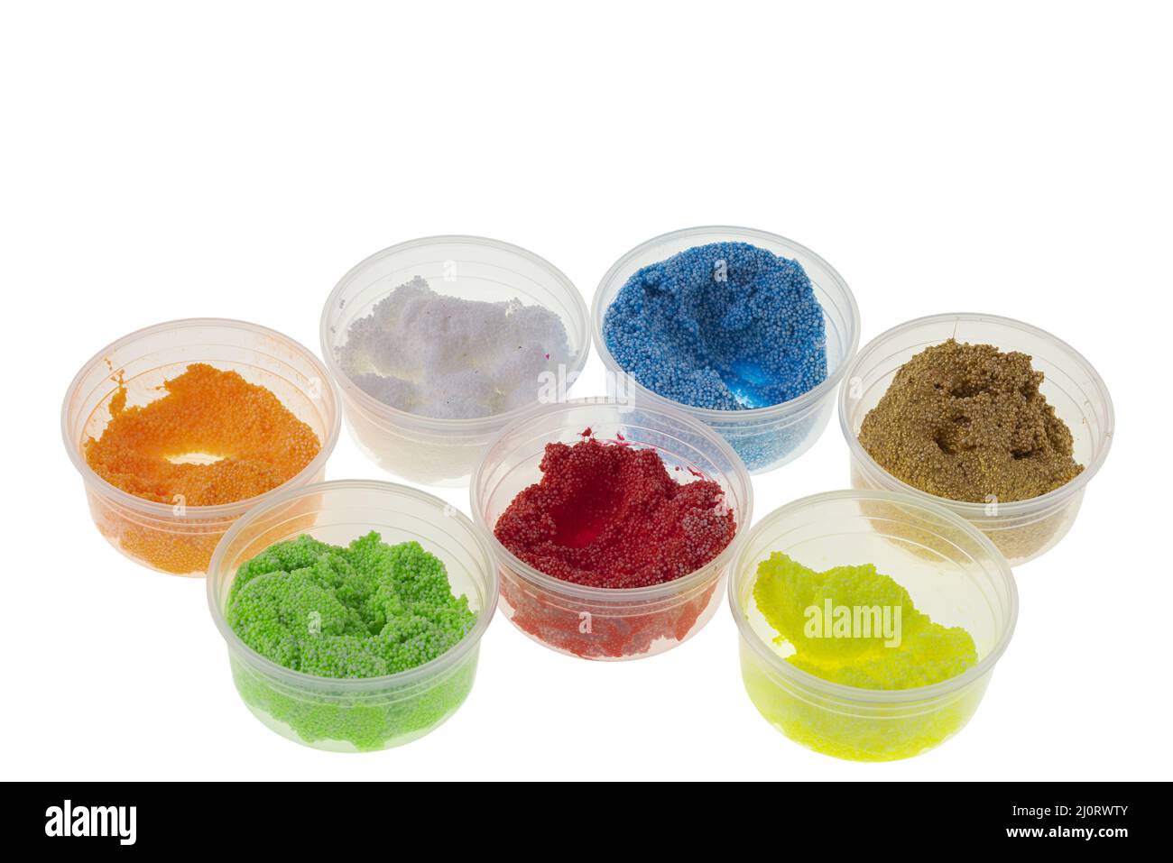 Close up view of colorful play dough materials isolated on white ...
