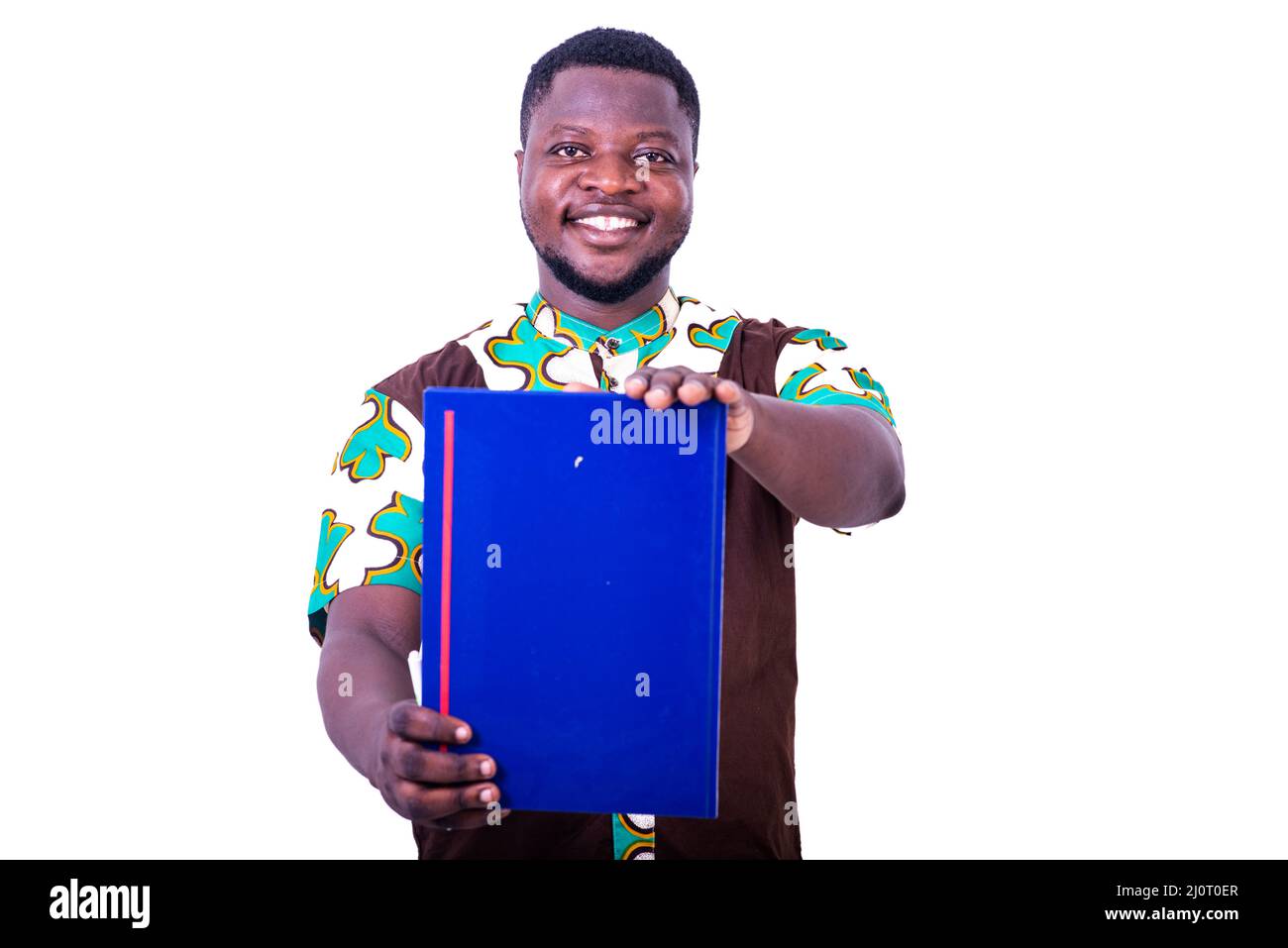 handsome happy young man showing his notebook and smiling at camera ...