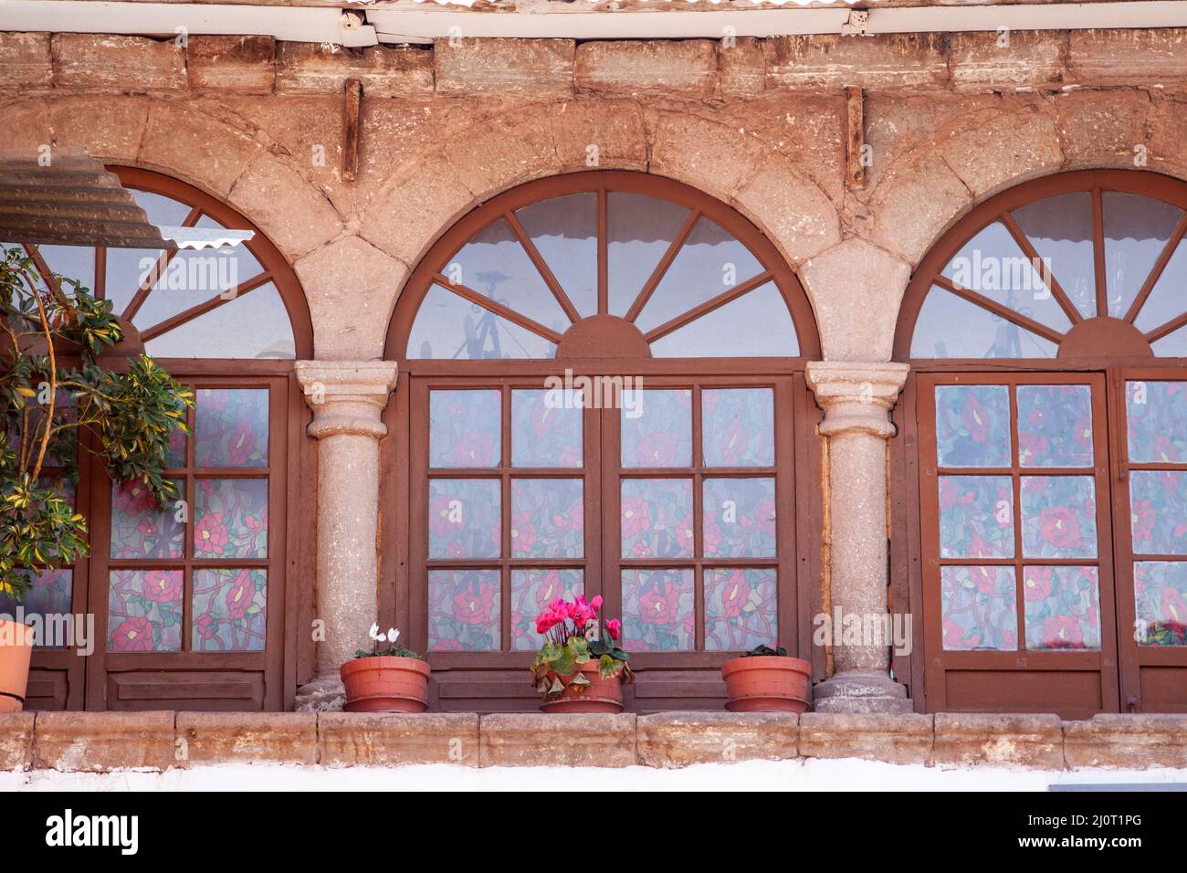 Closeup of the facade of a typical building in Cusco, Peru Stock Photo ...