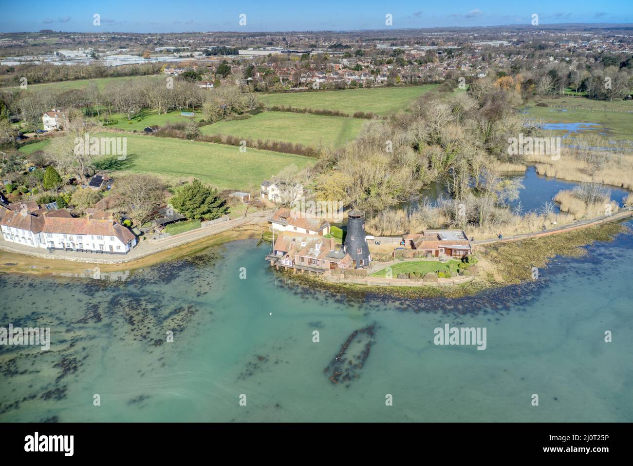 Aerial view over Langstone Harbour and the Langstone Windmill with the ...
