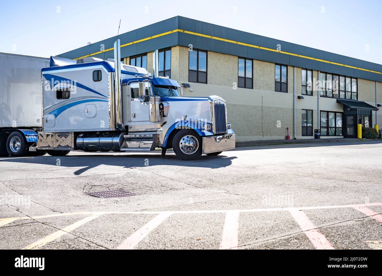 Long cab extended big rig classic semi truck tractor with shiny chrome ...